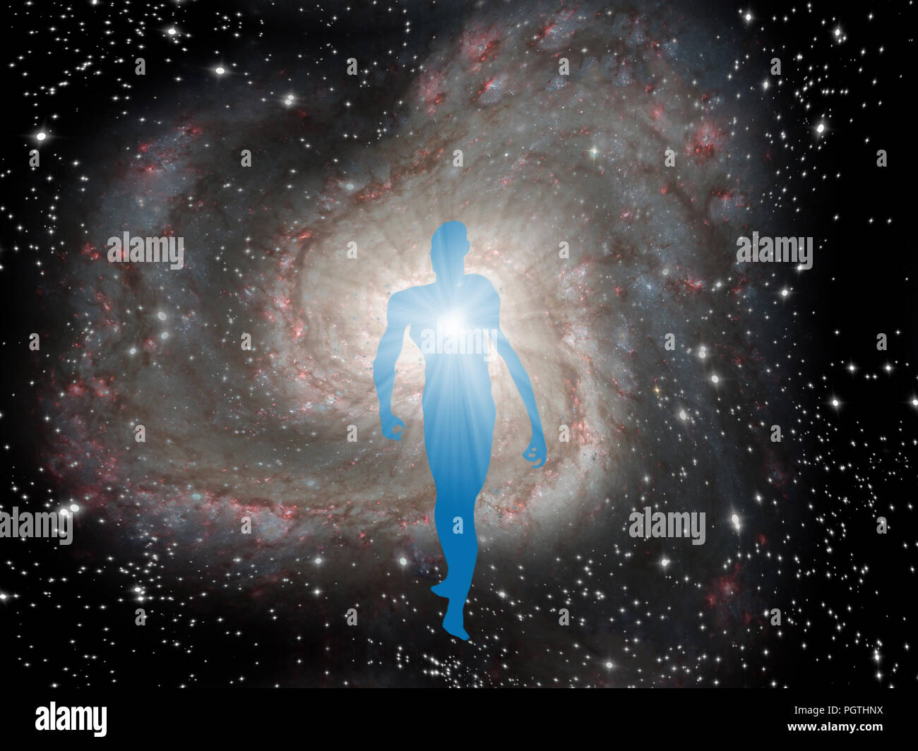 Figure of man in center of galaxy Stock Photo - Alamy