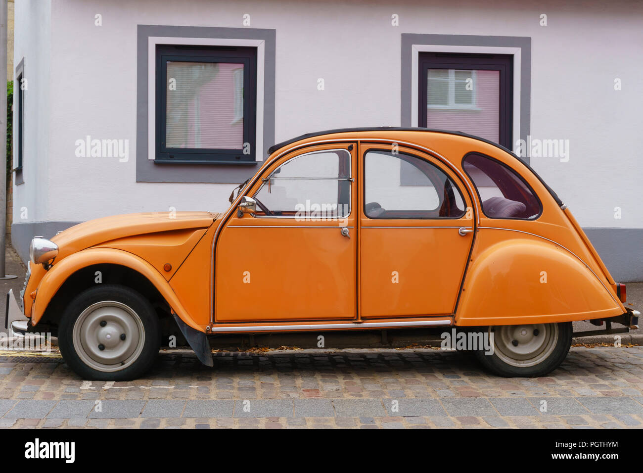 A Orange Citreon 2CV registered in 1987 parked on a street in Norwich ...
