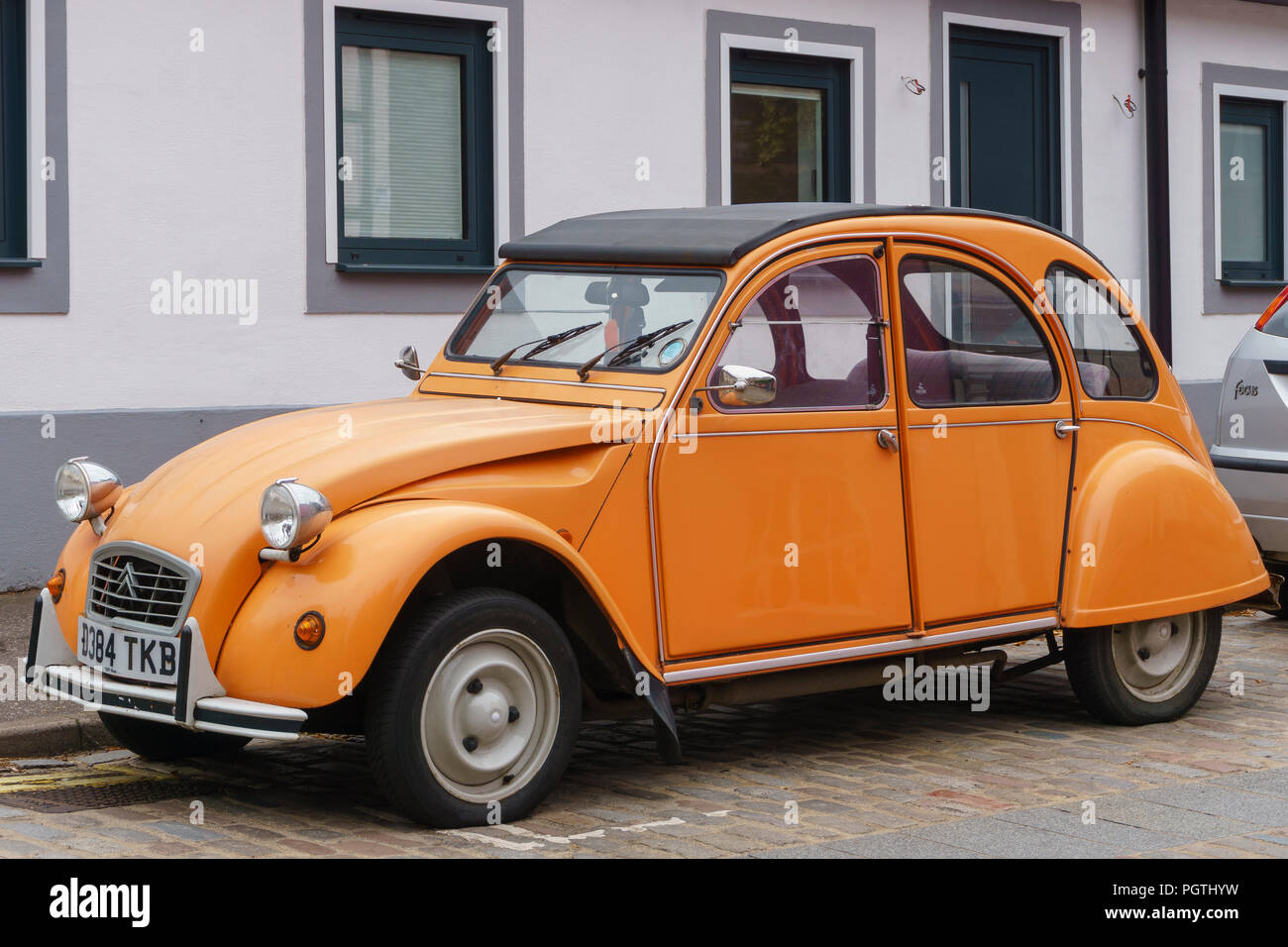 A Orange Citreon 2CV registered in 1987 parked on a street in Norwich ...