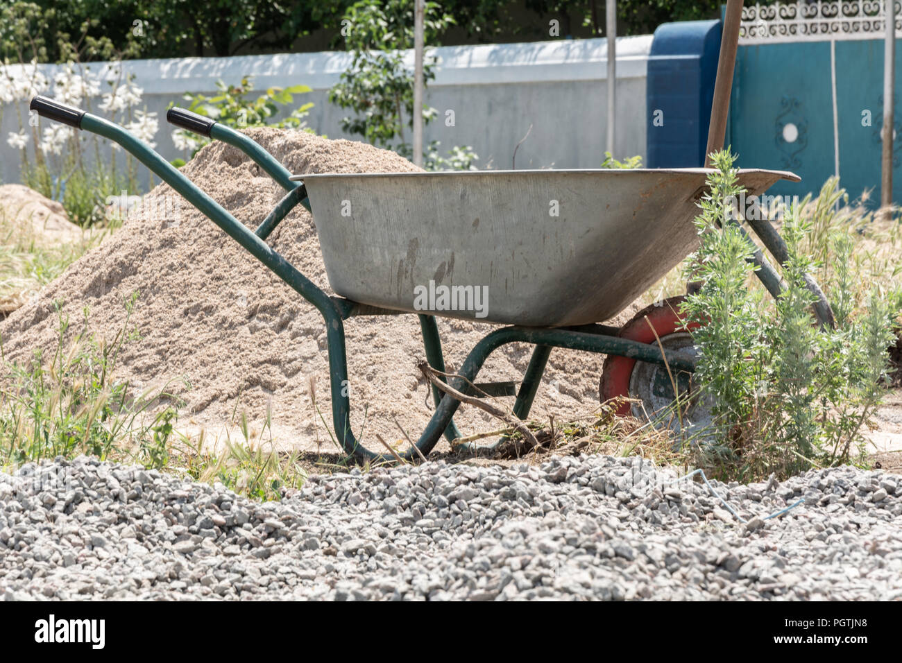 Wheel barrow construction site hi-res stock photography and images - Alamy