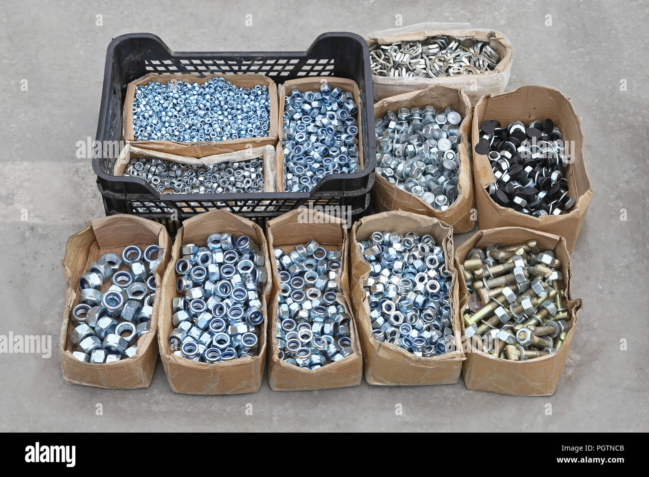 Boxes of nuts in hardware shop Stock Photo - Alamy
