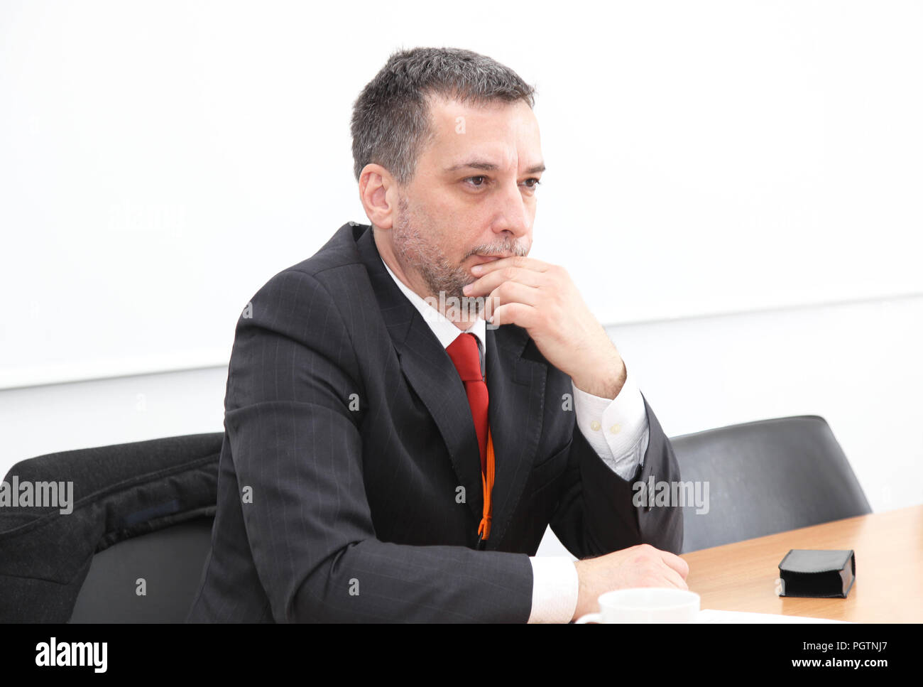 Man thinking at desk hi-res stock photography and images - Alamy
