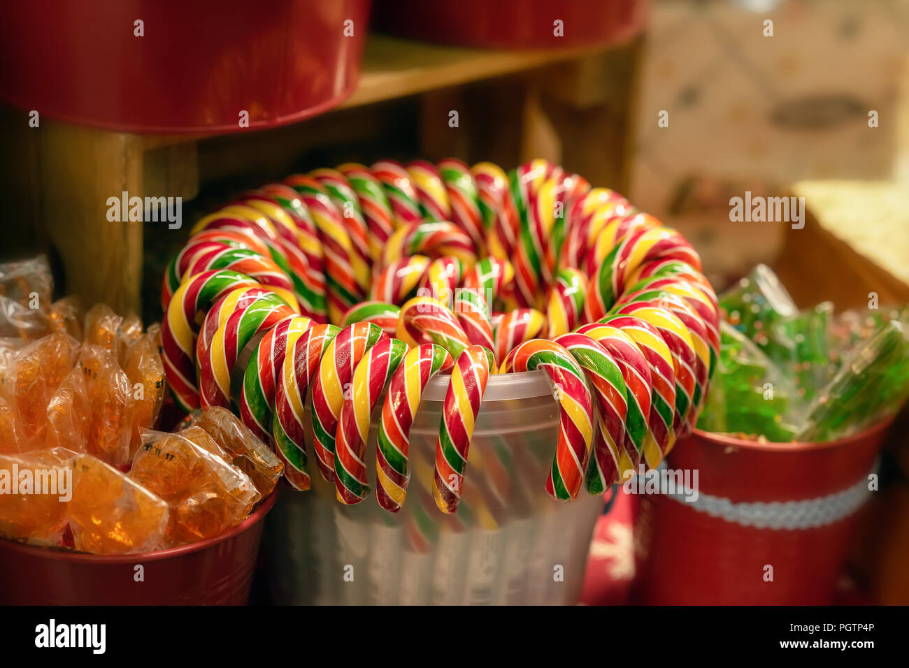 Traditional Christmas bright red lollipops, candies, on shop window of ...