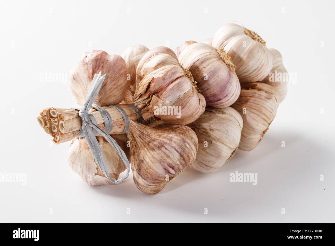 Close-up of a Bunch of Garlic (String of Garlic) on a white background ...