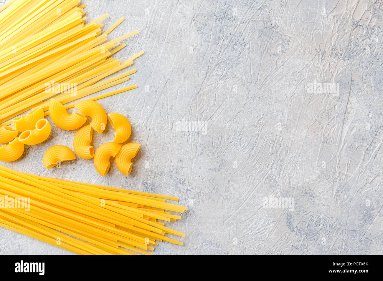 Variety of types and shapes of dry Italian pasta - Spaghetti, Linguine ...