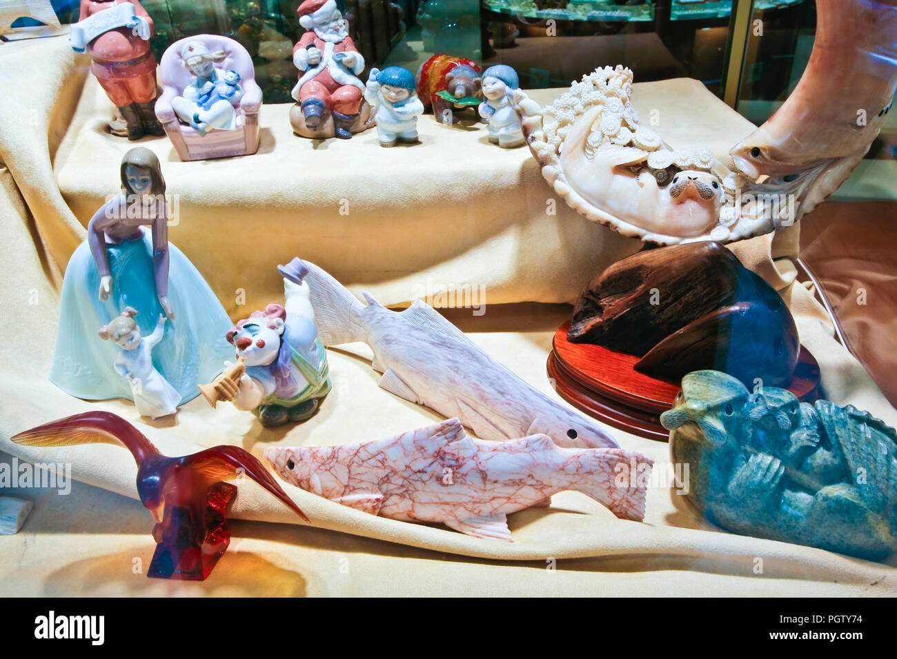 figurines in jewelry store window Stock Photo - Alamy