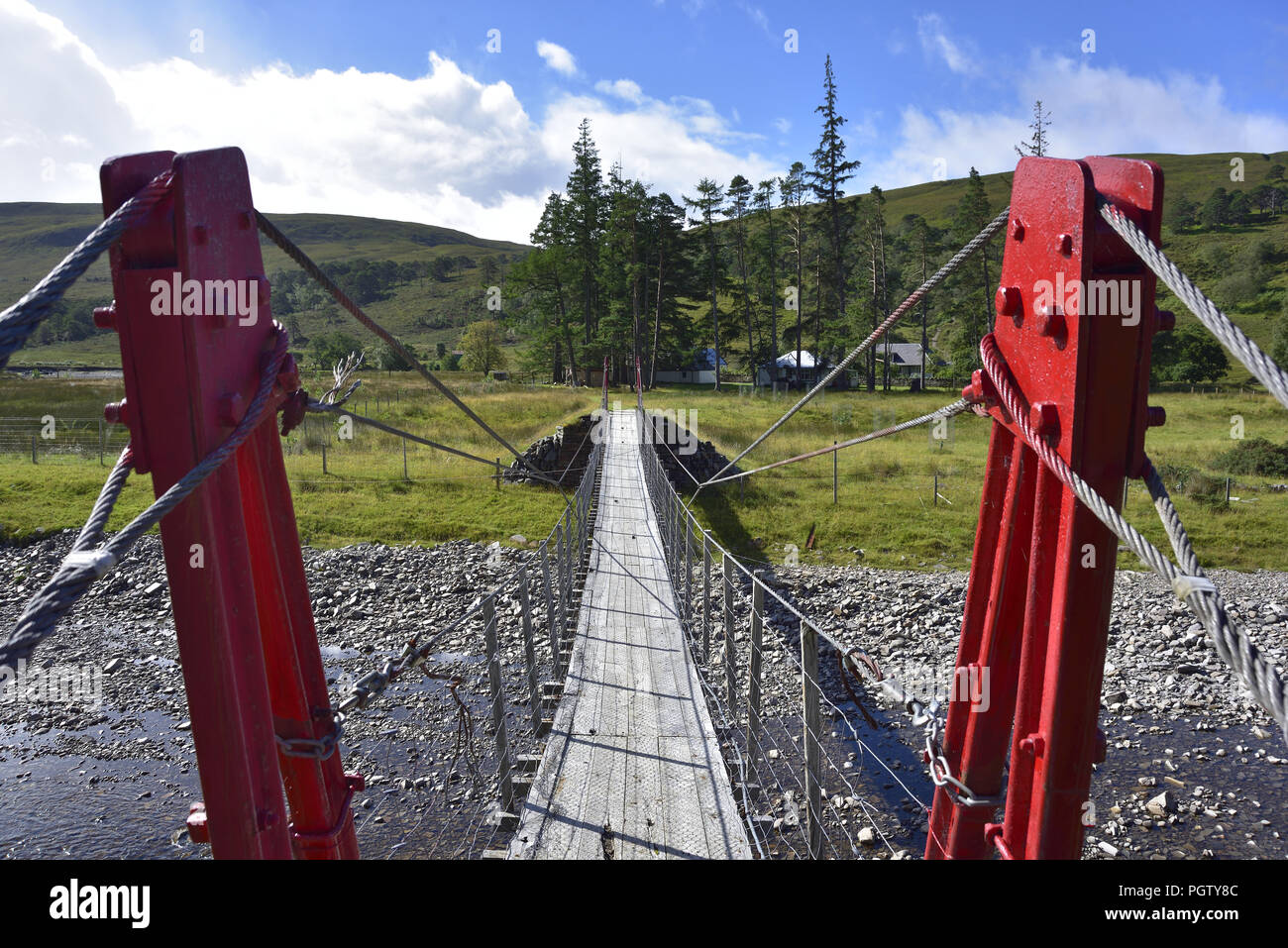 The River Rhiddorroch footbridge leading to East Rhiddorroch Lodge at ...