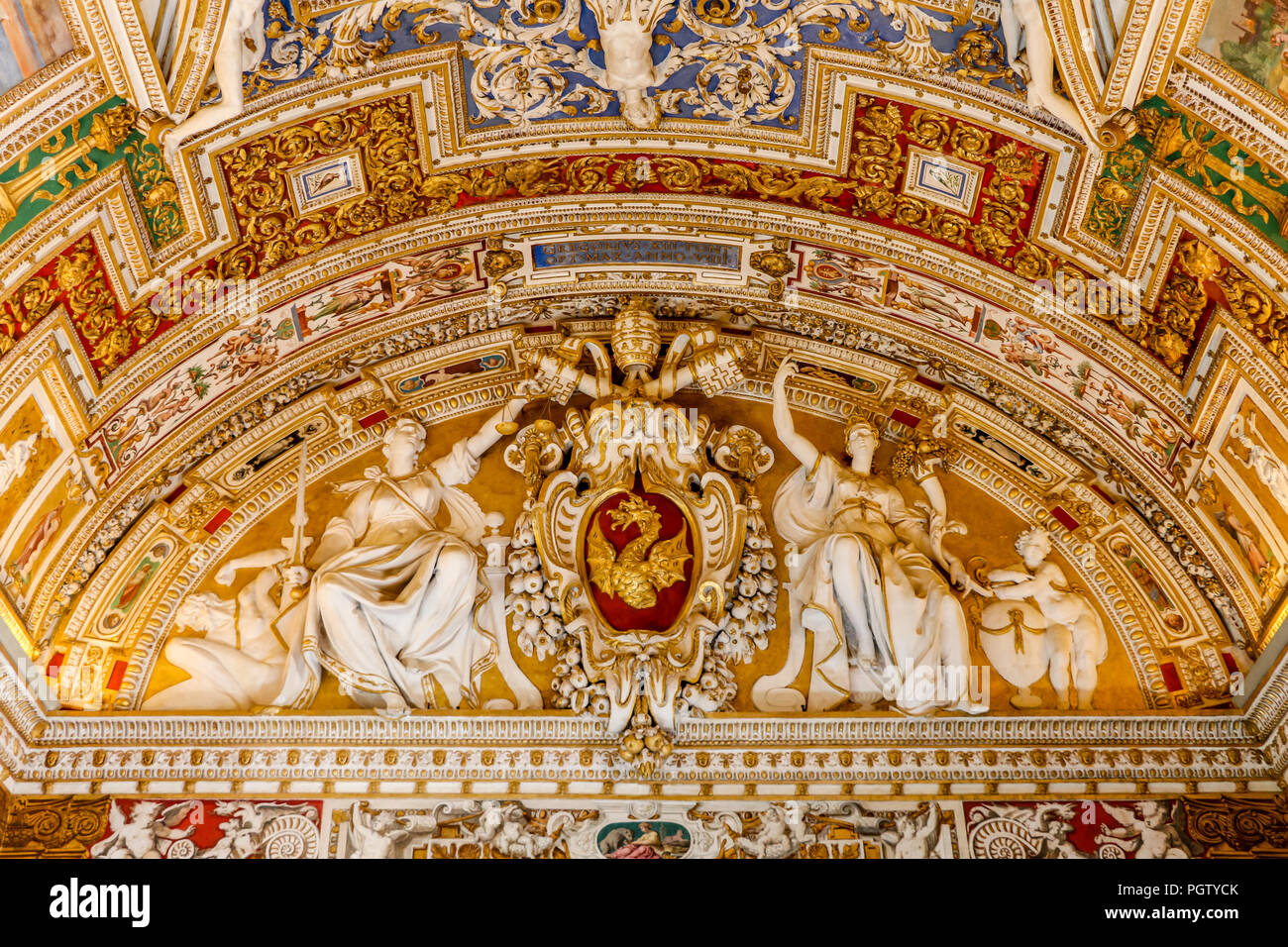 View of a beautiful sacred art at the ceiling St. Peter's Basilica ...