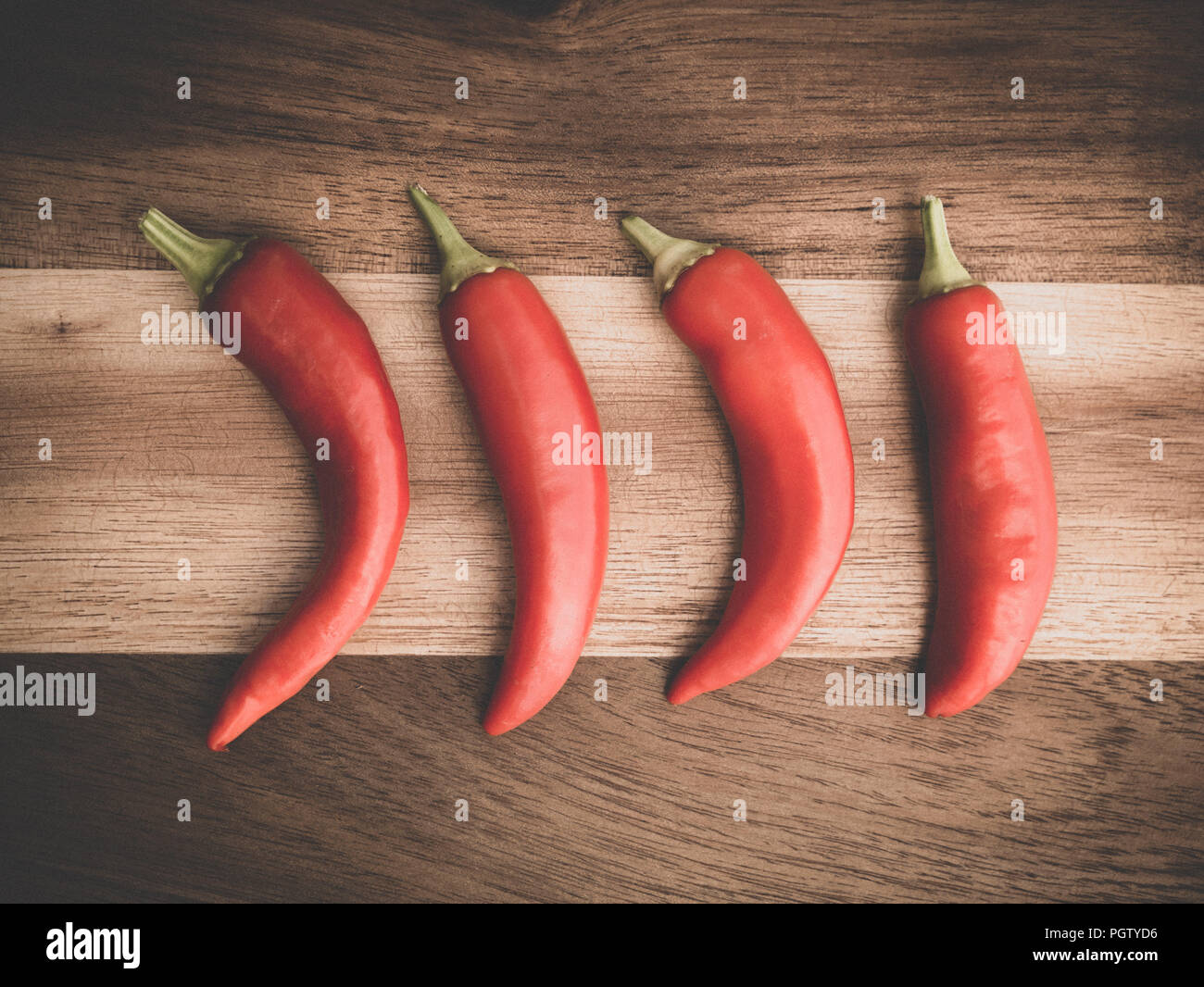 Decoration of red chili peppers on wodden board. Set Stock Photo - Alamy