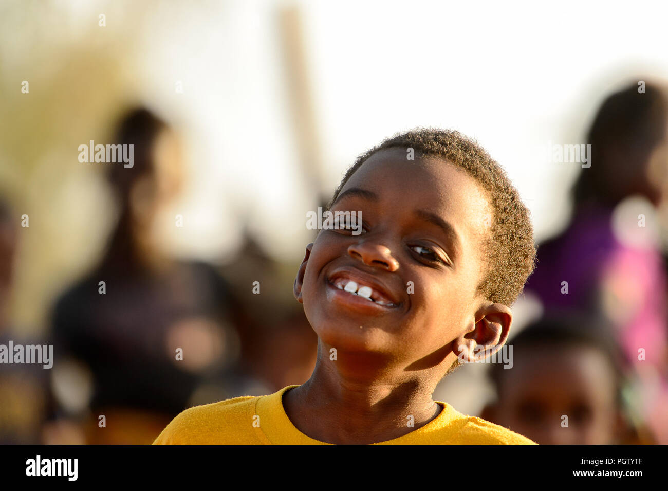 FERLO DESERT, SENEGAL - APR 25, 2017: Unidentified Fulani little boy ...