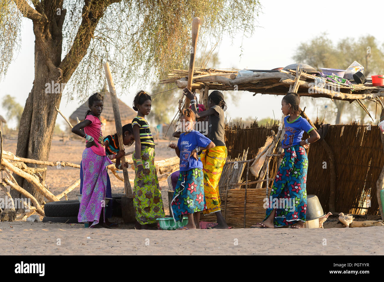 FERLO DESERT, SENEGAL - APR 25, 2017: Unidentified Fulani women stand ...