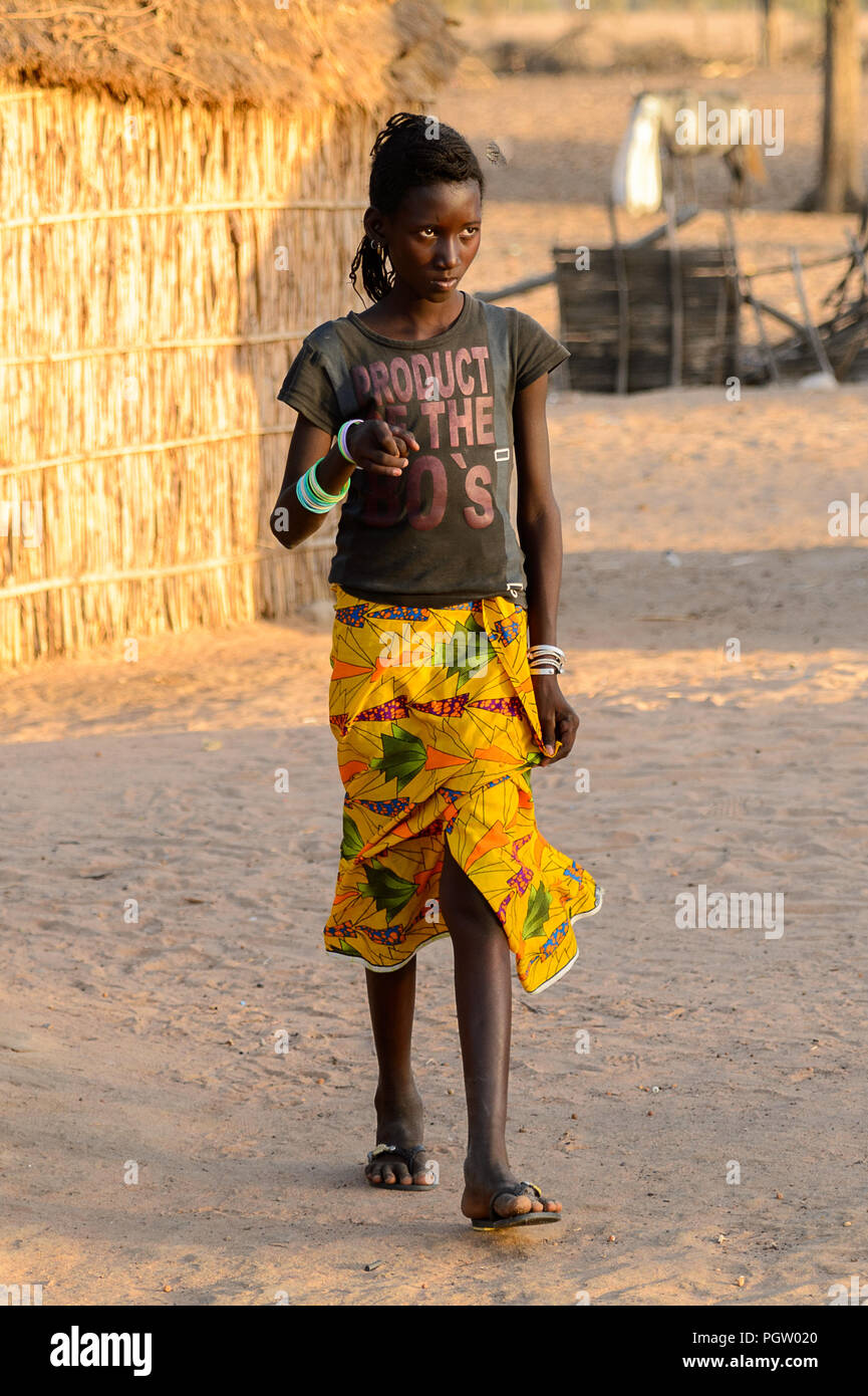 FERLO DESERT, SENEGAL - APR 25, 2017: Unidentified Fulani girl with ...