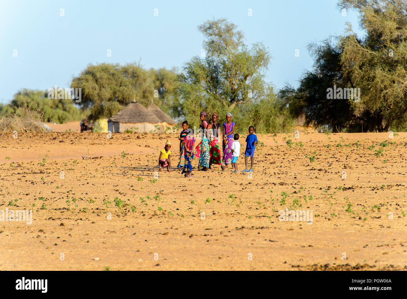 FERLO DESERT, SENEGAL - APR 25, 2017: Unidentified Fulani children play ...
