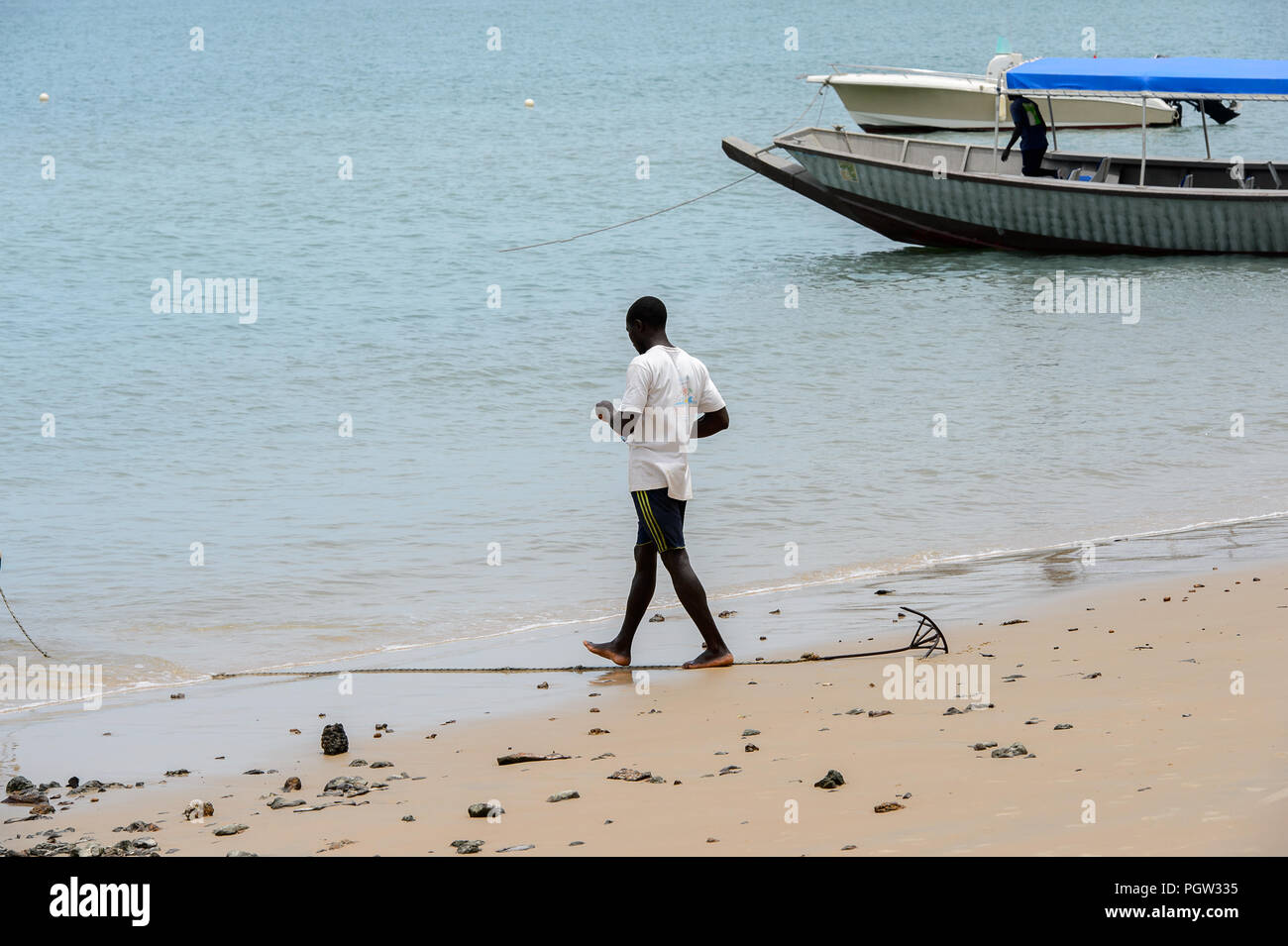 RUBANE, GUINEA BISSAU - MAY 4, 2017: Unidentified local on the coast of ...