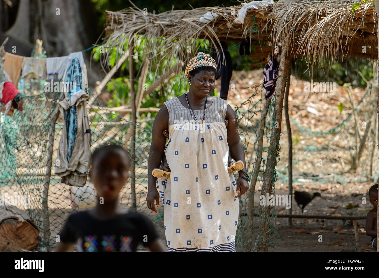 CANHABAQUE, GUINEA BISSAU - MAY 4, 2017: Unidentified local woman in ...