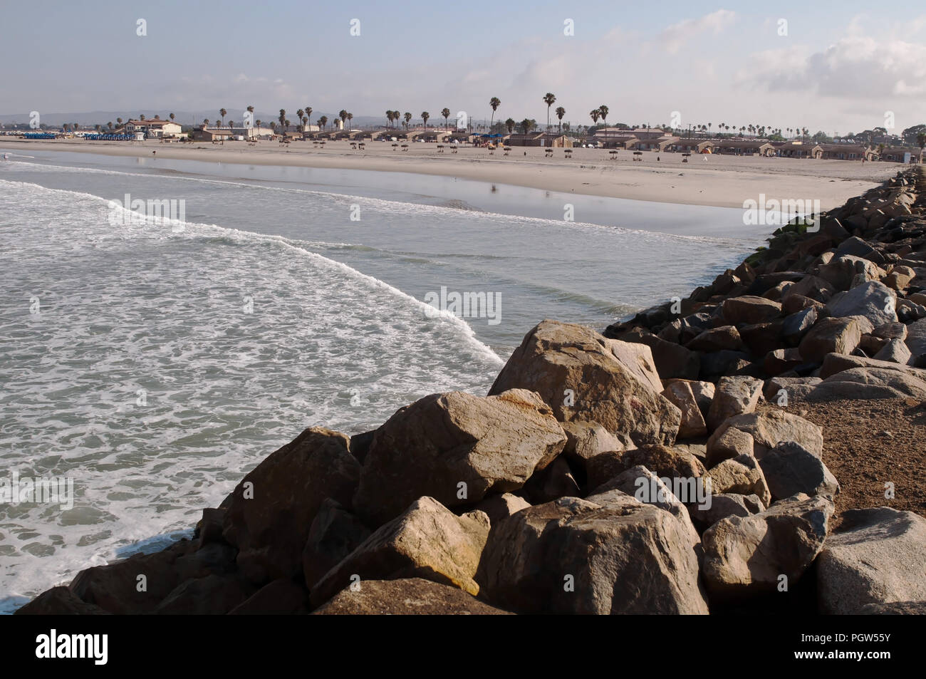 A rocky jetty looking at the beach at Camp Pendleton South, a USMC base ...