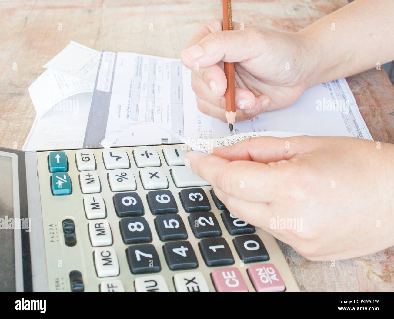 document money and calculator for check control expense Stock Photo - Alamy