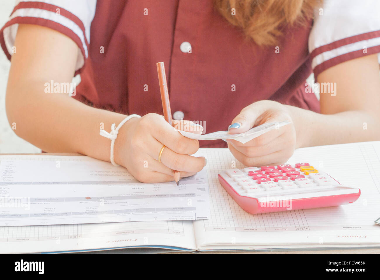 document and notebook monthly record expense credit card and woman ...