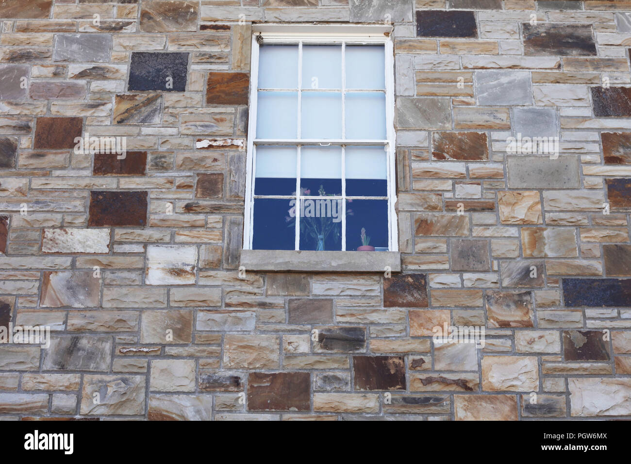 A stone wall with a window Stock Photo - Alamy