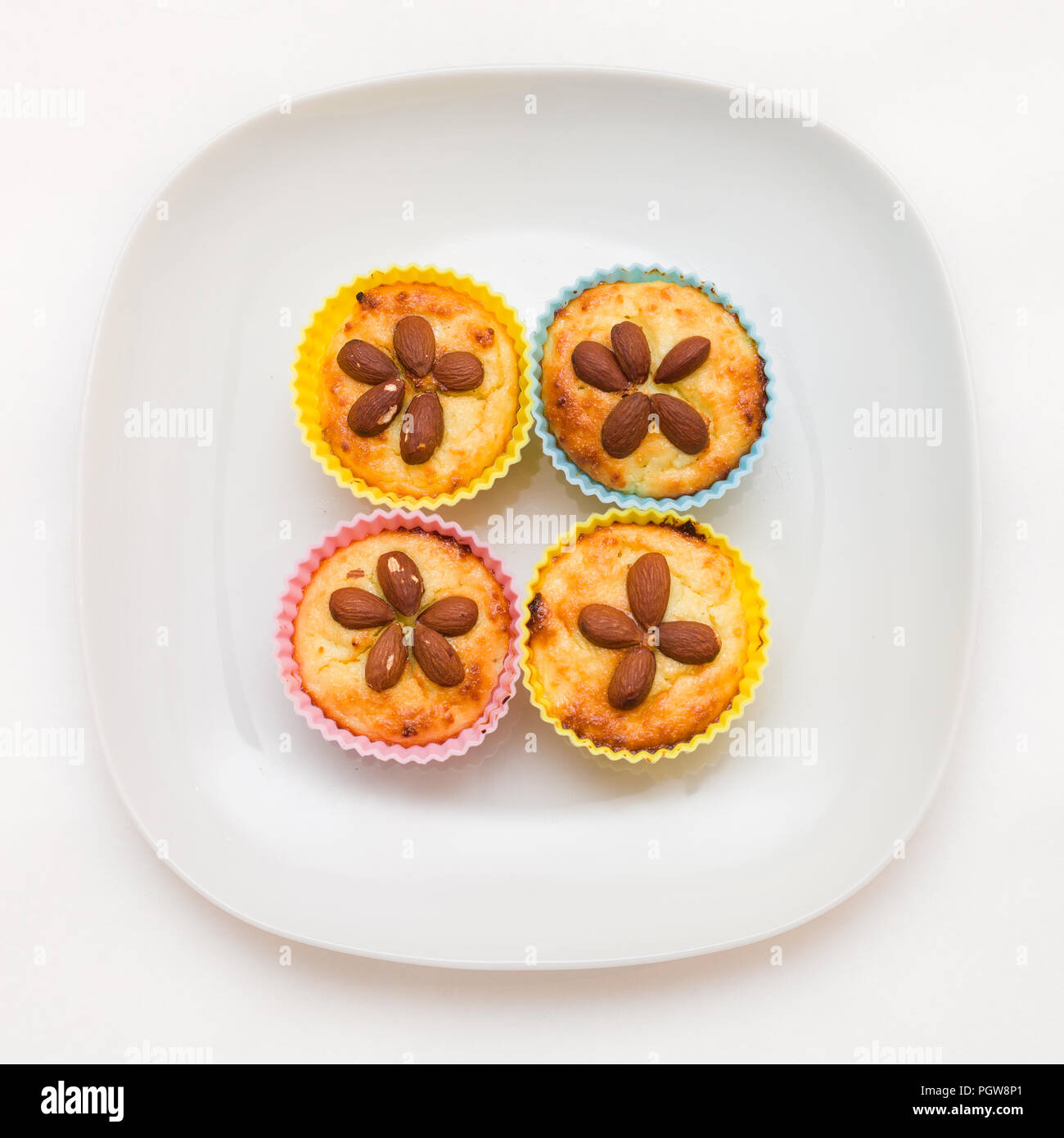 home-made round mini pies decorated with almonds for healthy lifestyle ...
