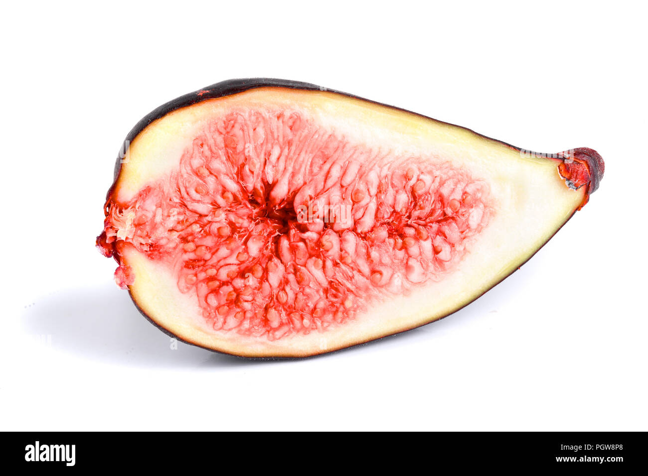 half of fresh fig fruit isolated on white background Stock Photo - Alamy