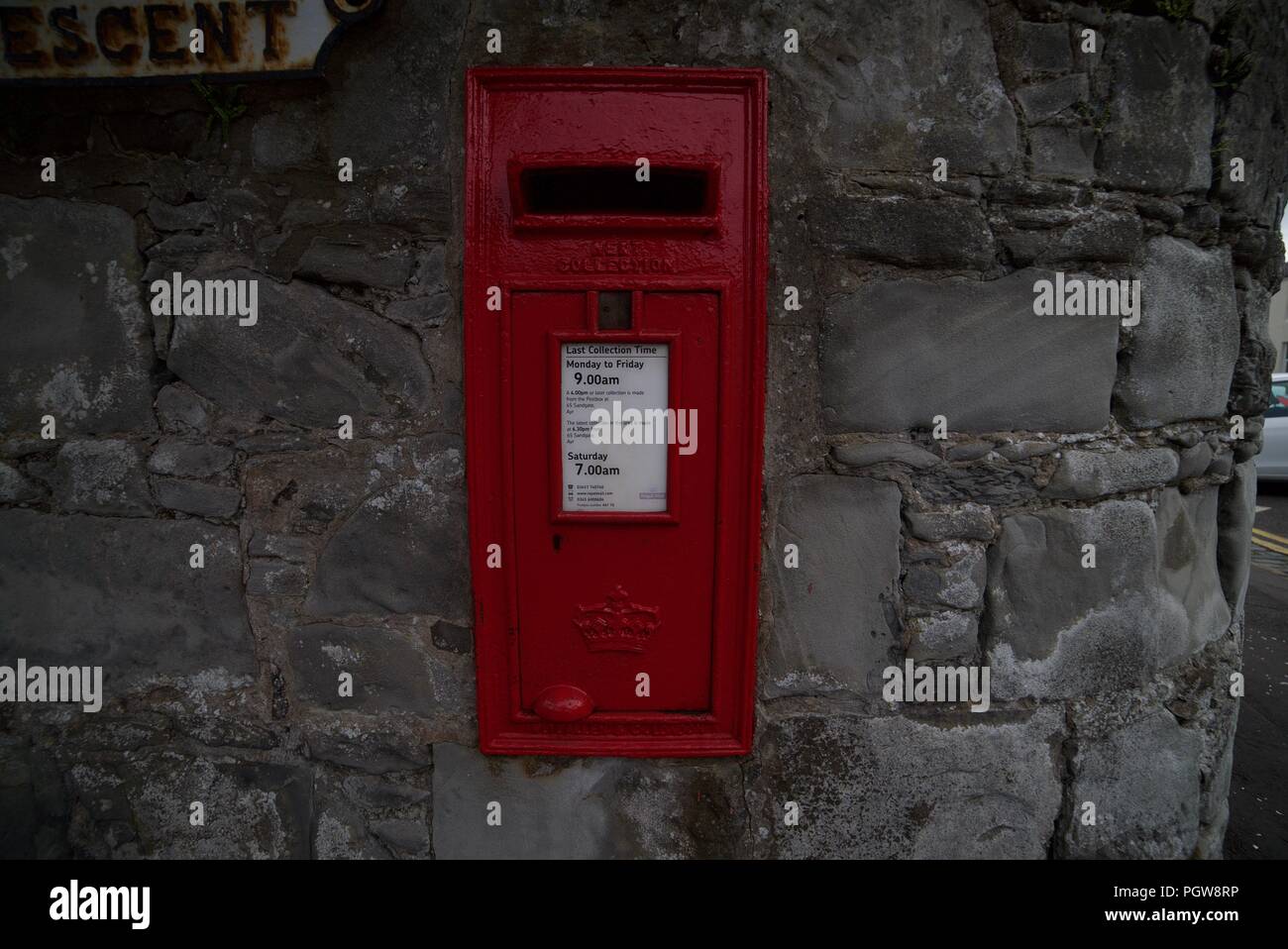 Red Post Box on a wall on a British Street Stock Photo - Alamy
