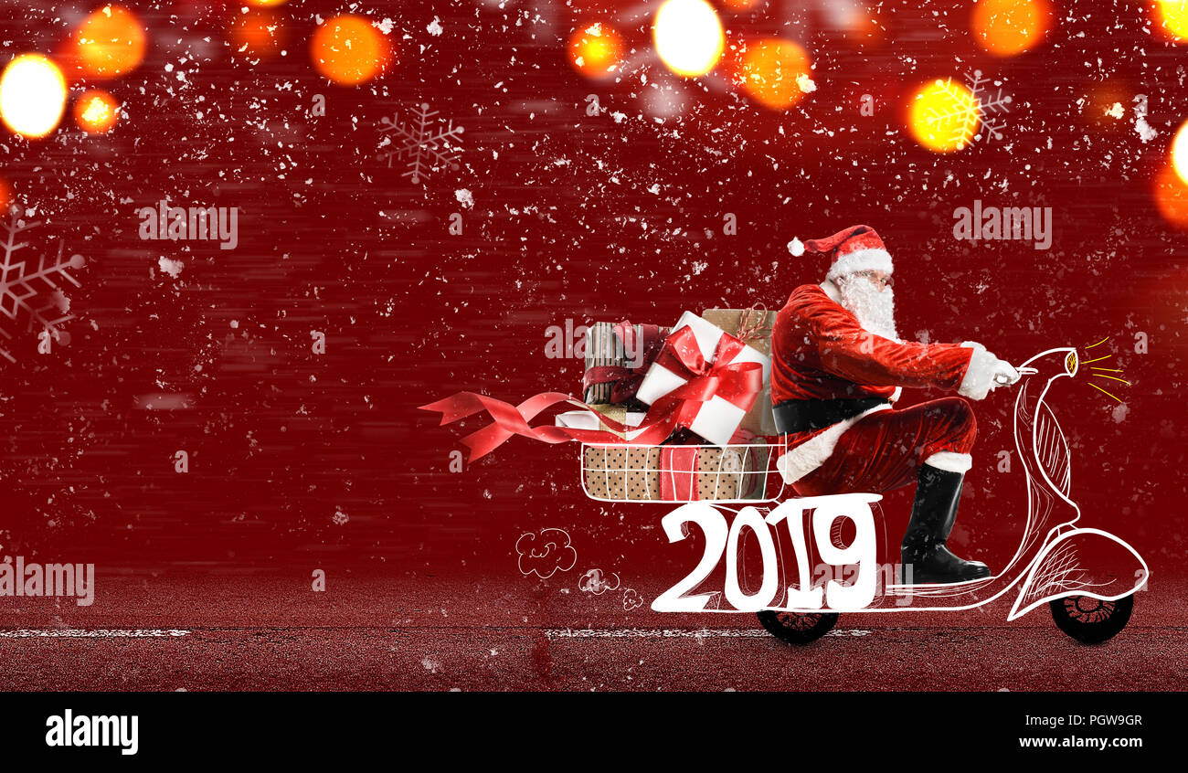 Santa Claus on scooter Stock Photo - Alamy