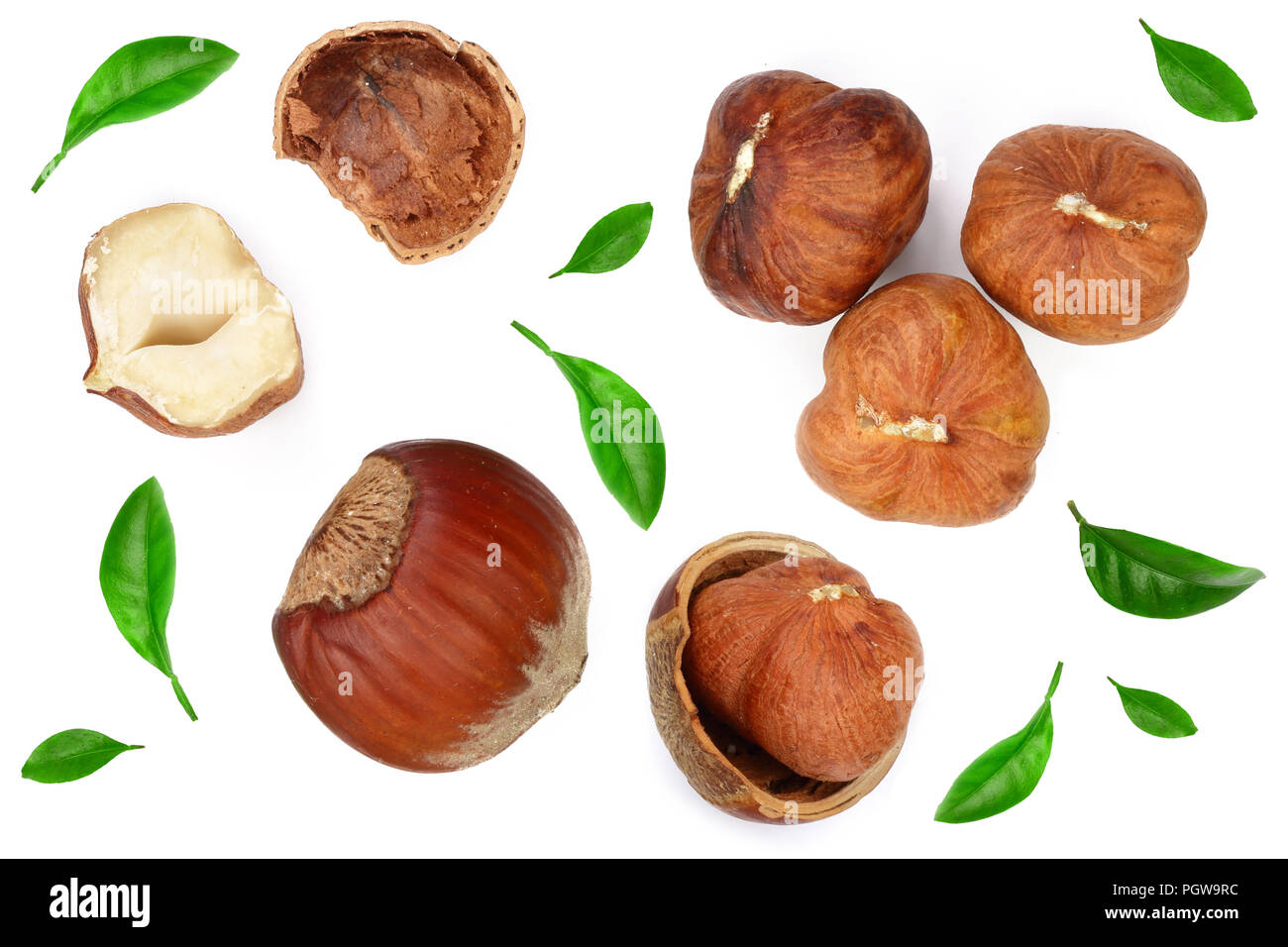 Hazelnuts with leaves isolated on white background. Top view. Flat lay ...