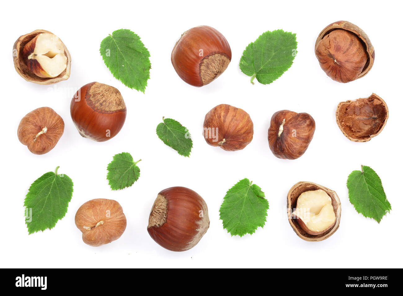 Hazelnuts with leaves isolated on white background. Top view. Flat lay ...