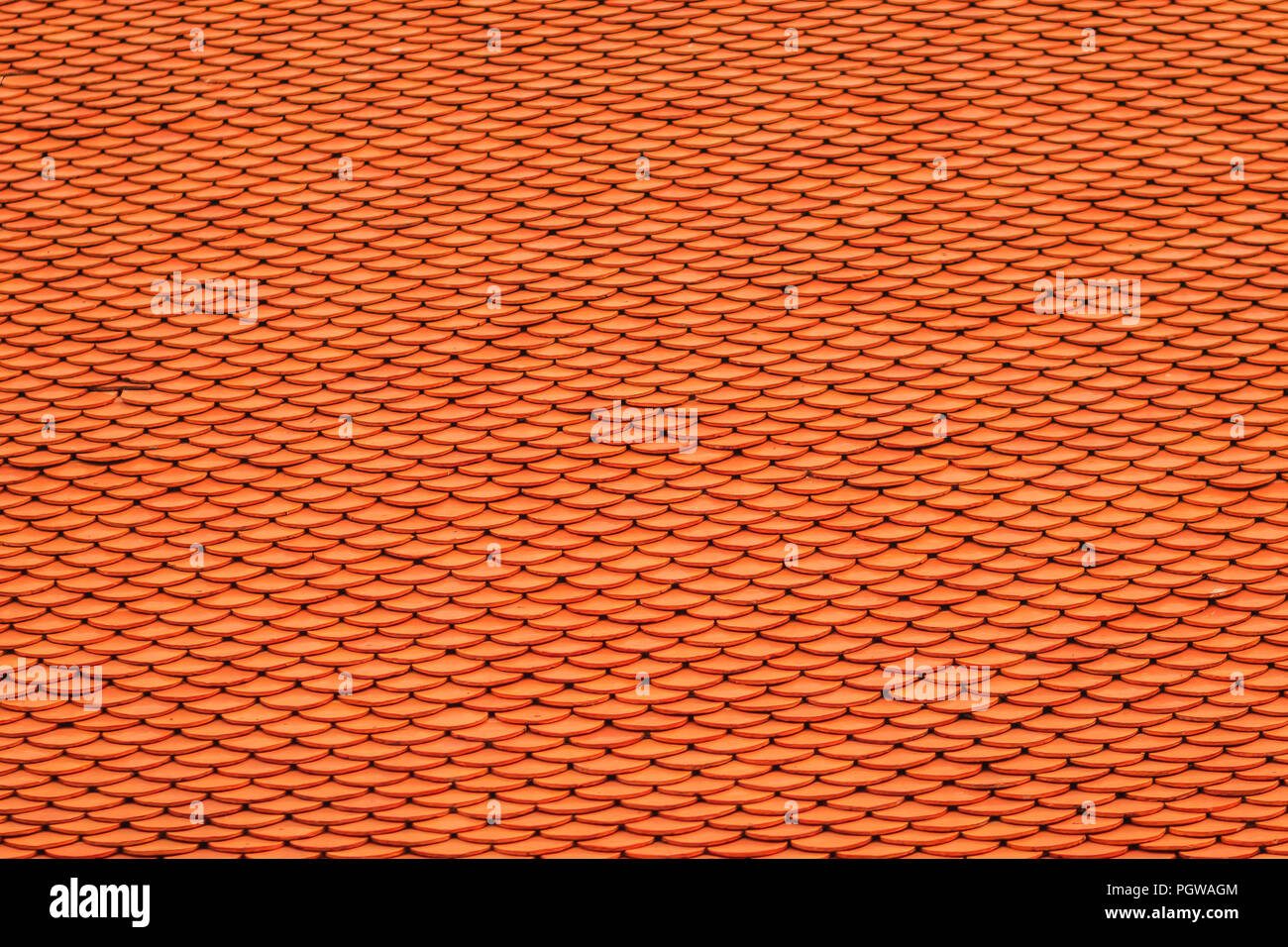 Old antique orange roof tiles pattern at the buddha temple in thailand ...