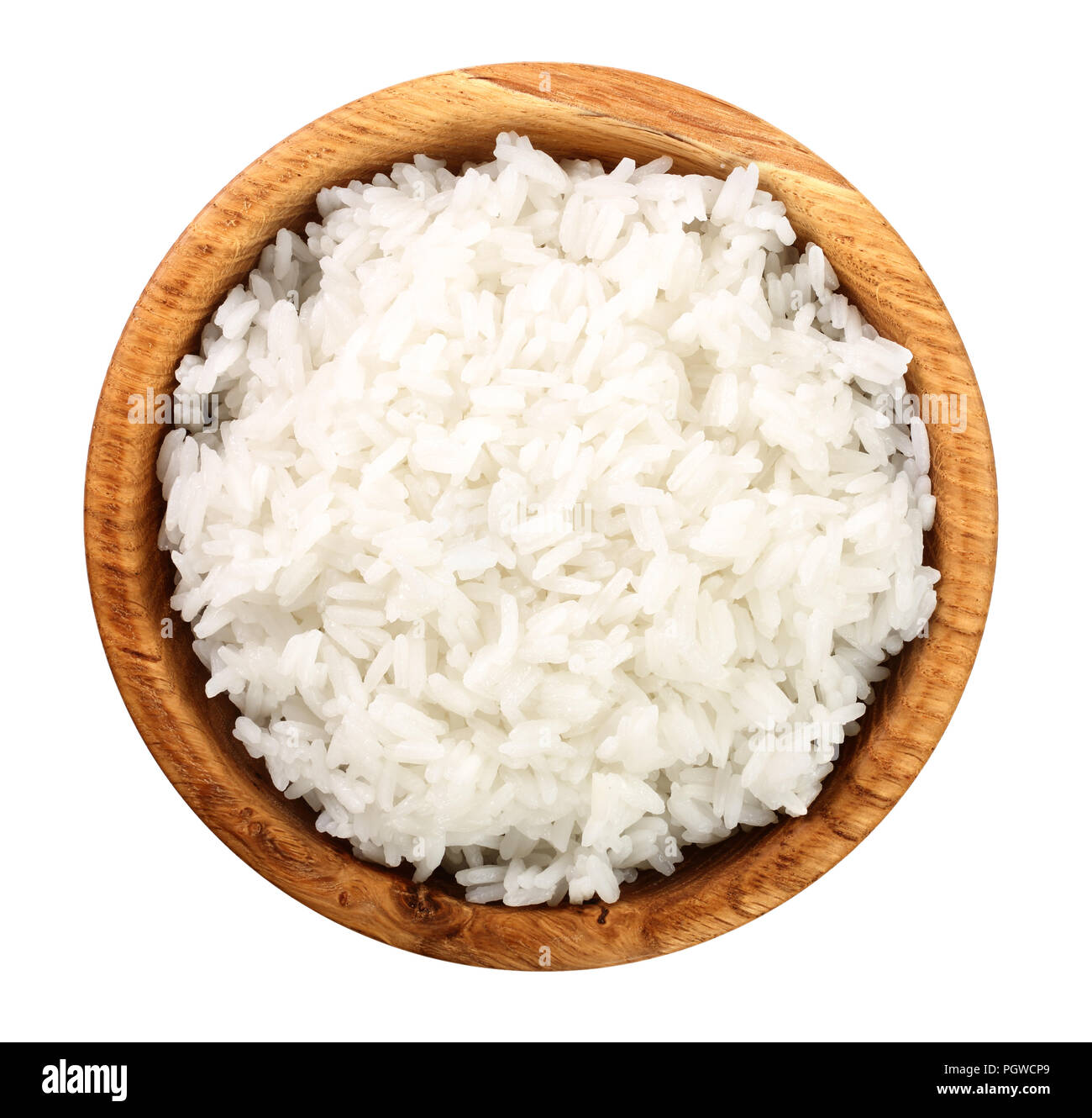 rice in a wooden bowl isolated on white background. Top view. Flat lay ...