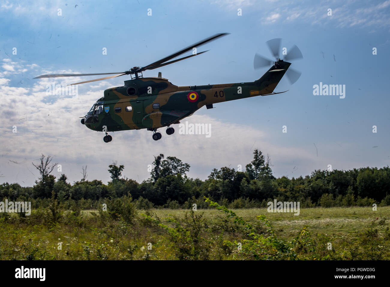 A Romanian air force IAR-330 Puma helicopter takes off after simulating ...