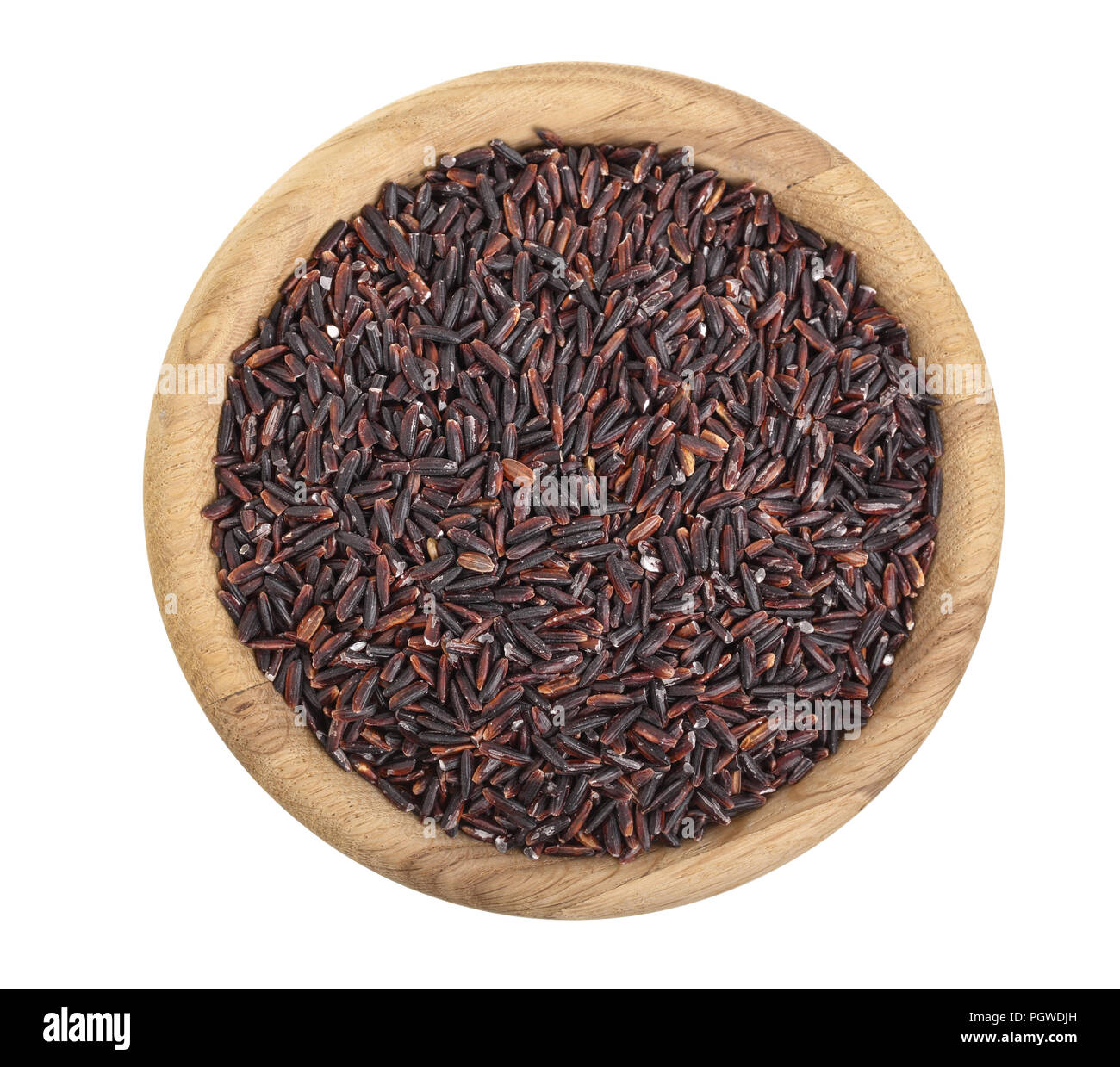 black rice grains in wooden bowl isolated on white background. Top view ...