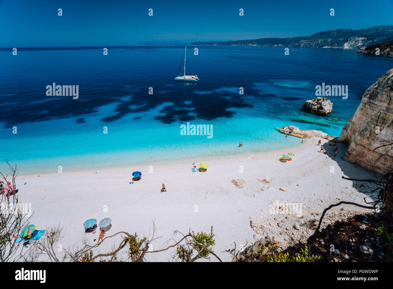 Fteri beach, Cephalonia Kefalonia, Greece. White catamaran yacht in ...