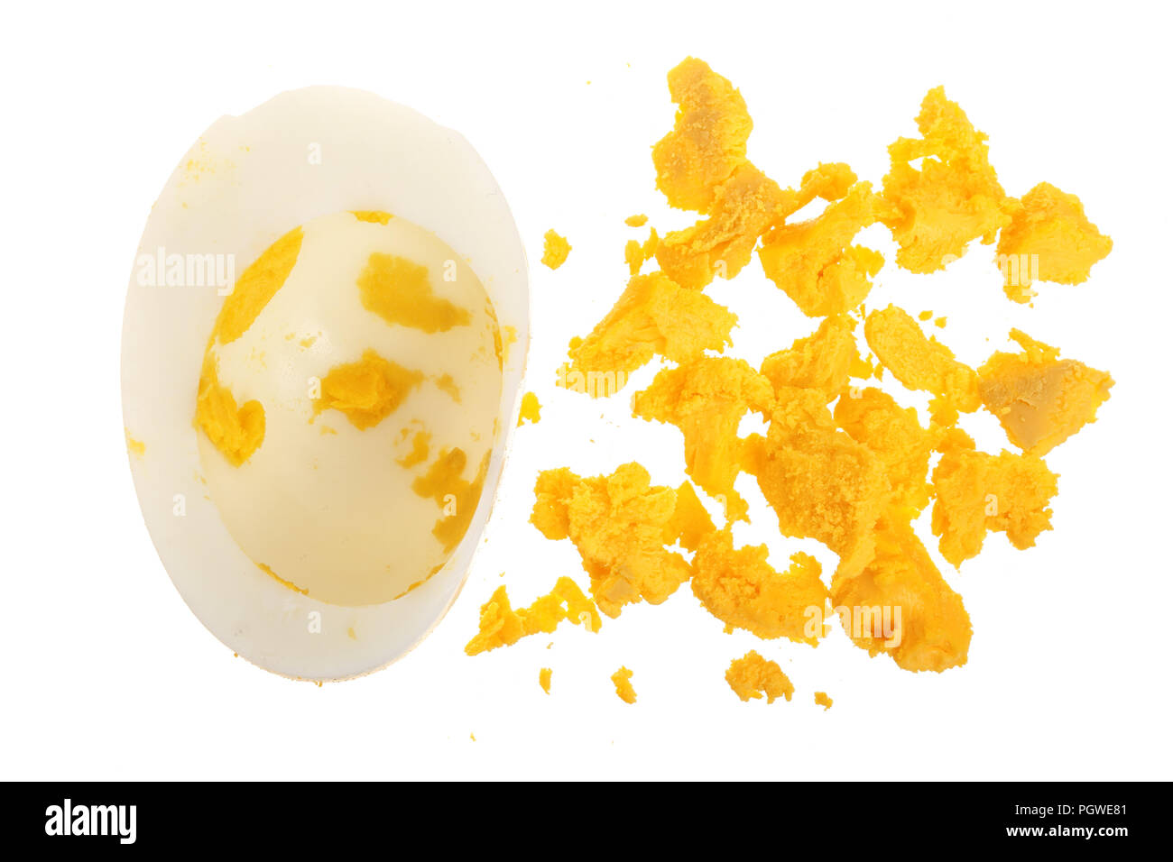 egg yolk crumbled isolated on white background. Top view. Flat lay ...