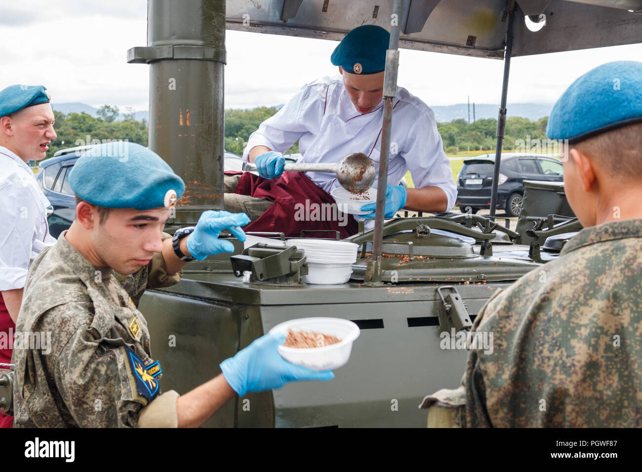 VLADIVOSTOK, RUSSIA - AUGUST 26, 2018: Soldiers treat people with ...