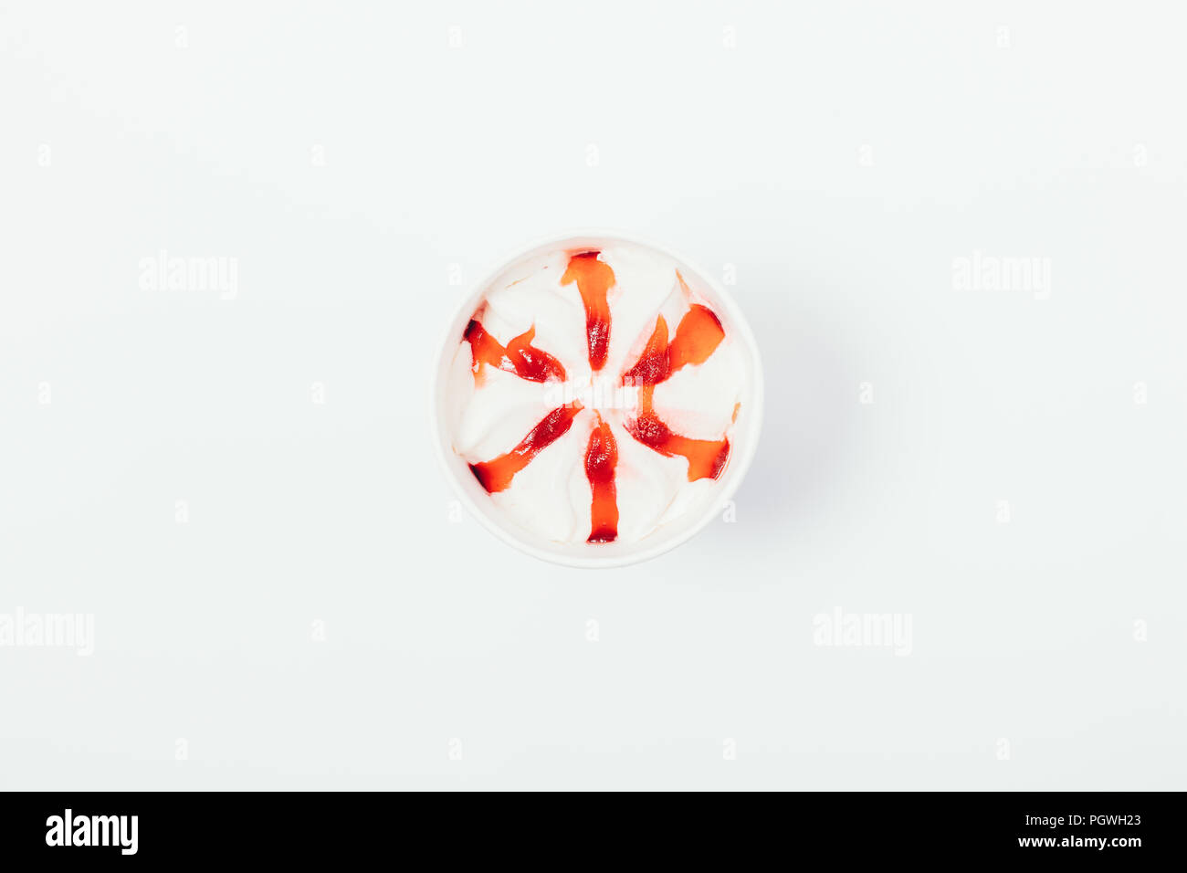 Ice cream with topping red syrup, top view. Flat lay minimal ...