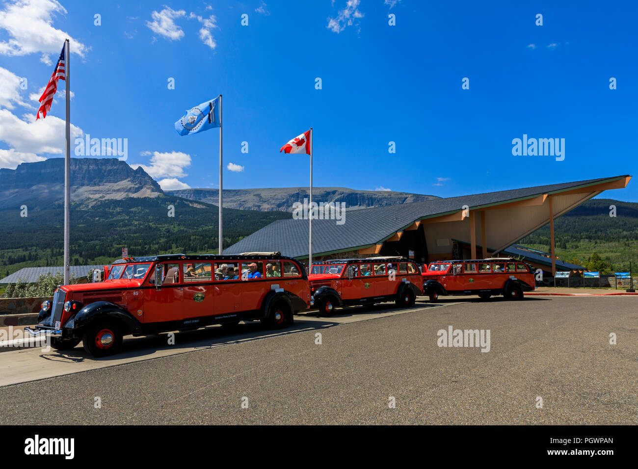 Red bus glacier national park hi-res stock photography and images - Alamy