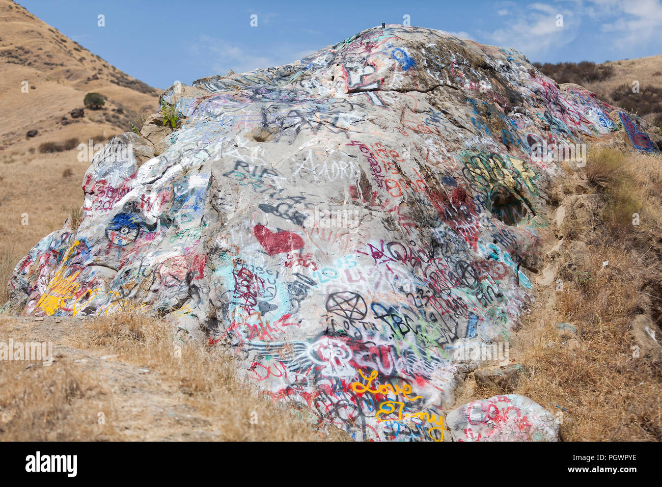 Graffiti on a boulder (graffiti in nature) - California USA Stock Photo ...