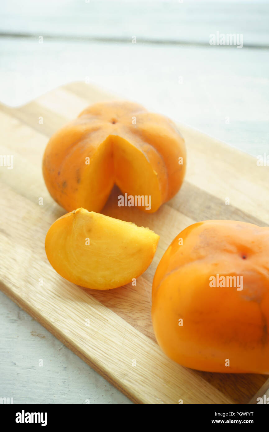 Persimmon on a white background, persimmon orange in front view Stock ...