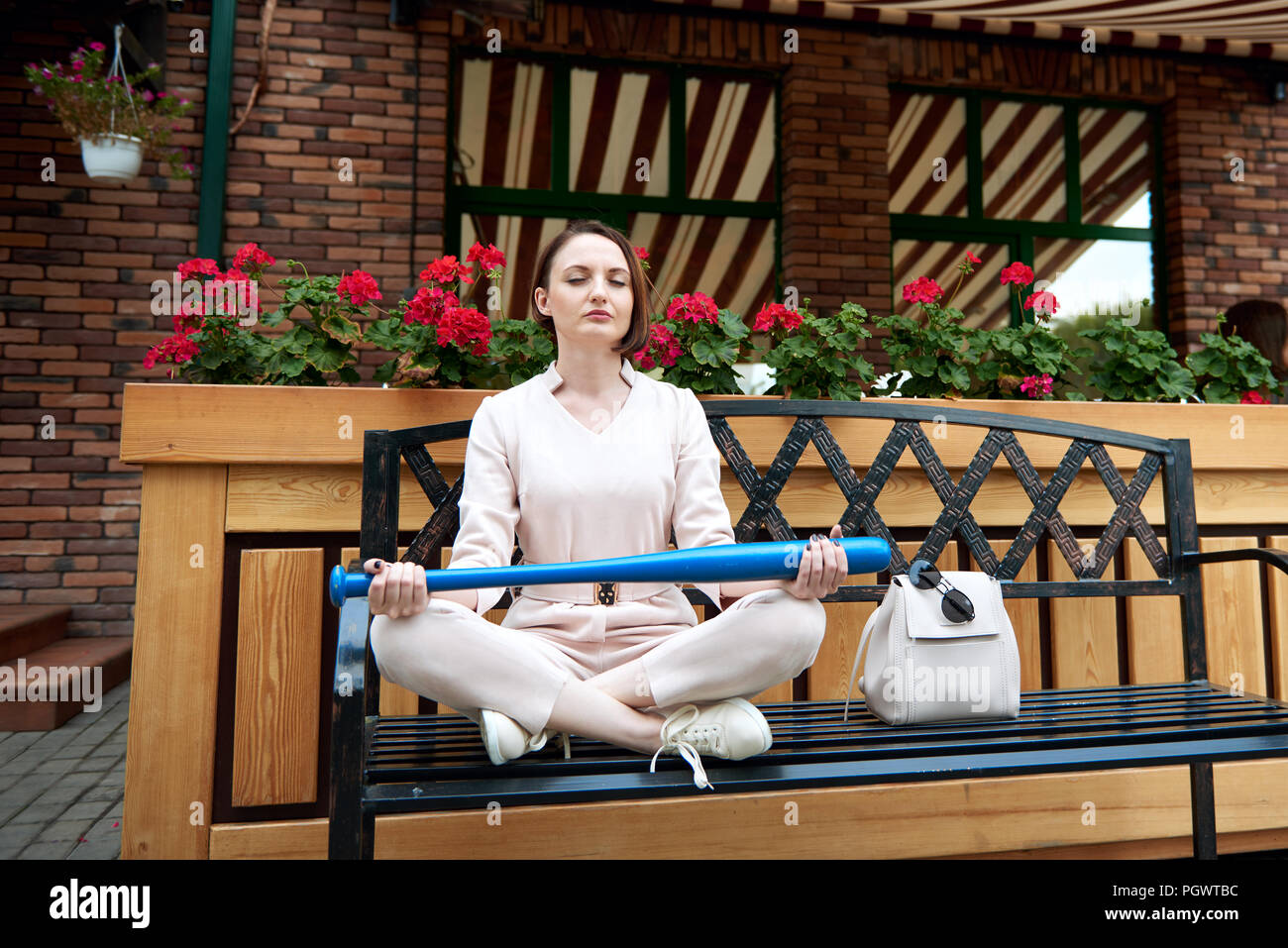 Girl sitting on bat hi-res stock photography and images - Alamy