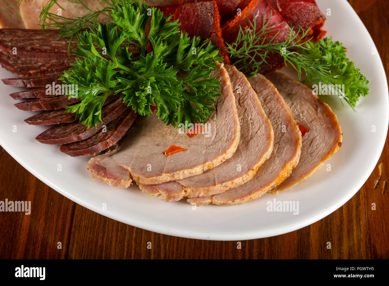 Meat plate - tongue, beef, chicken Stock Photo - Alamy