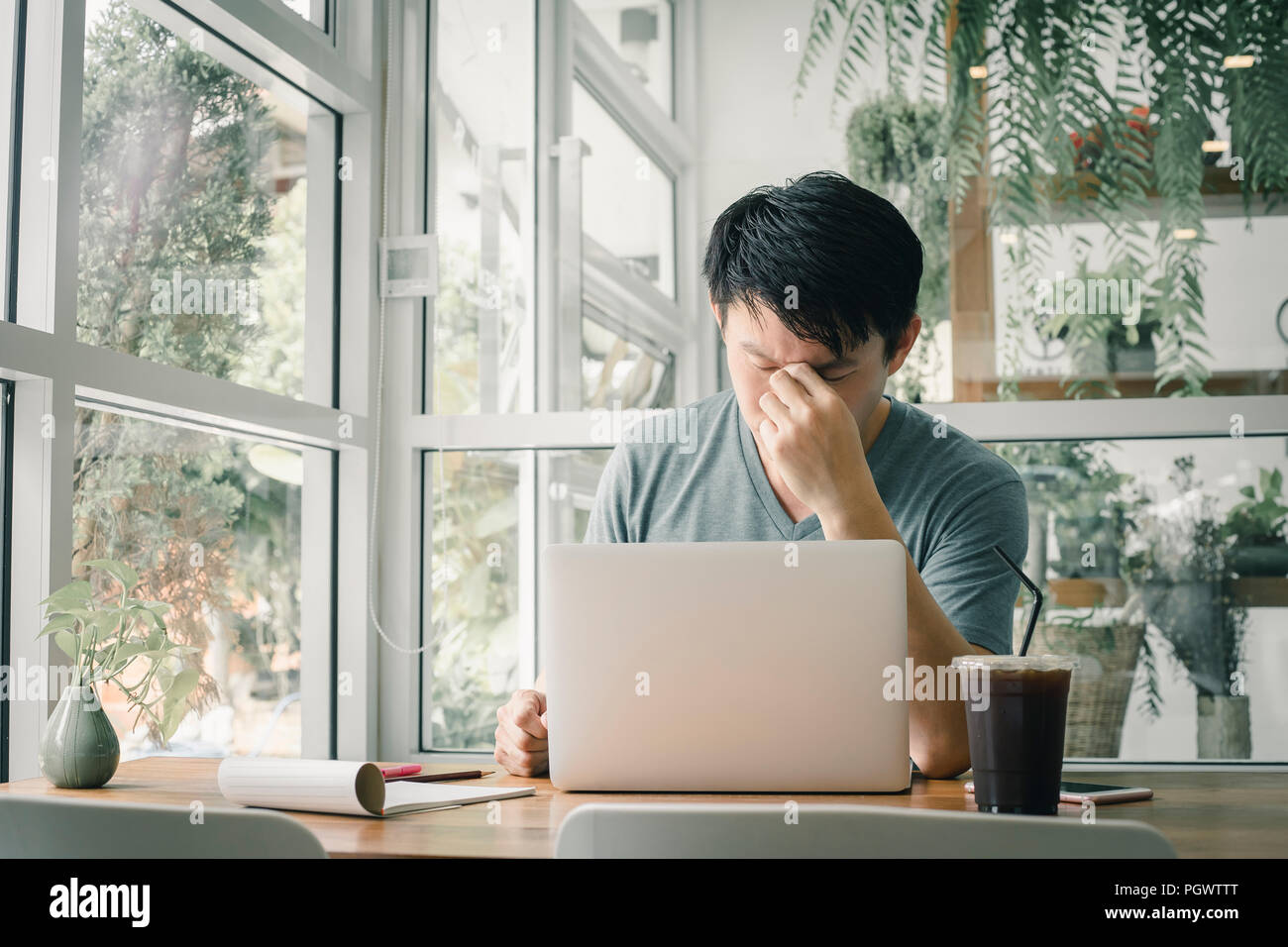 Freelancer man working online at his home Stock Photo - Alamy