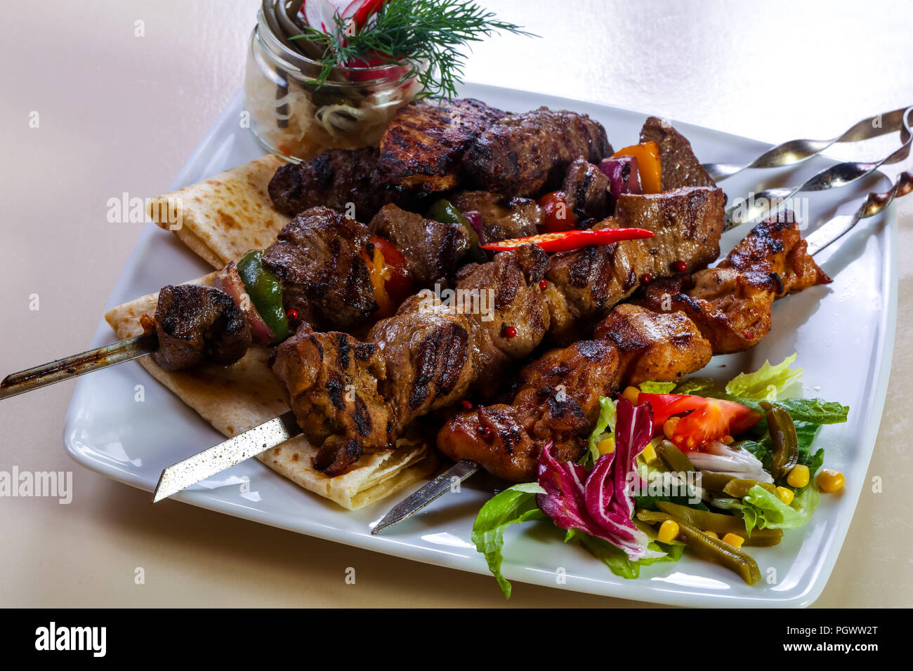 Barbeque meat mix plate with vegetalbes Stock Photo - Alamy