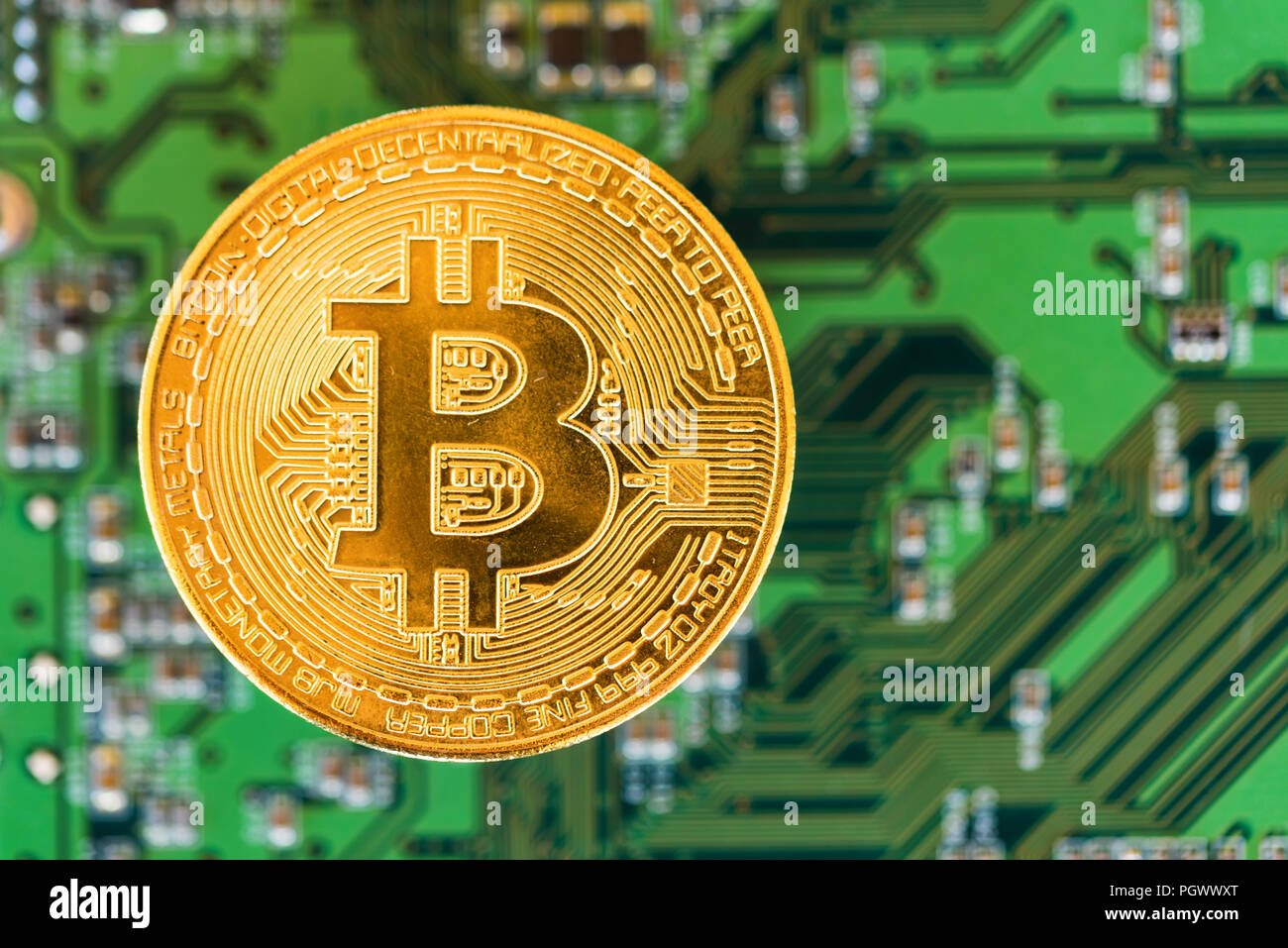 Golden brand new bitcoin on green digital background Stock Photo - Alamy