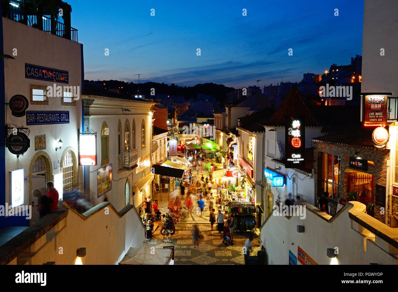 Elevated view of the R 5 de Outubro shopping street in the evening with ...
