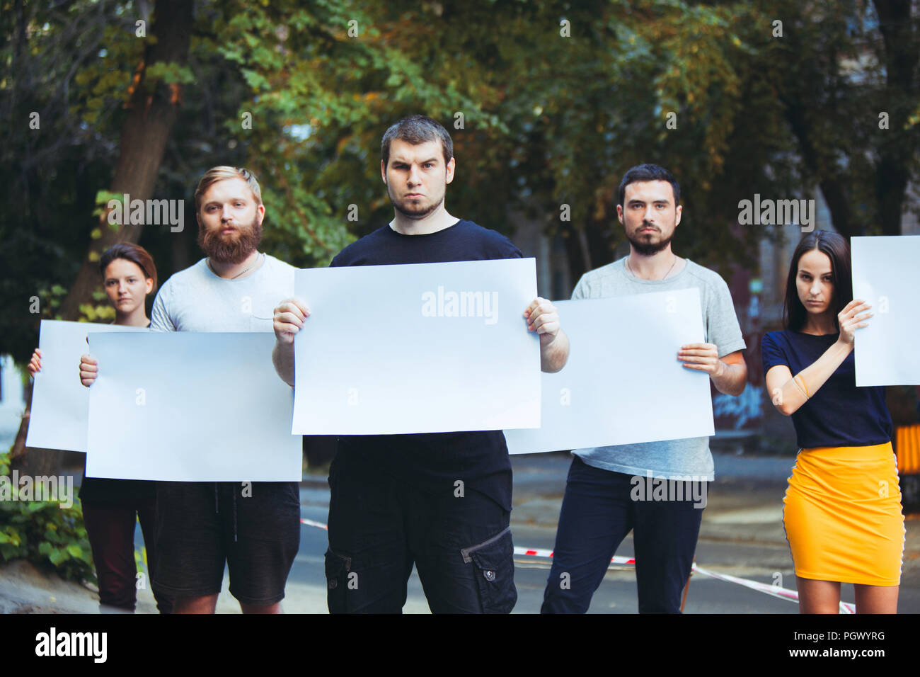 Group of protesting young people outdoors. The protest, people ...