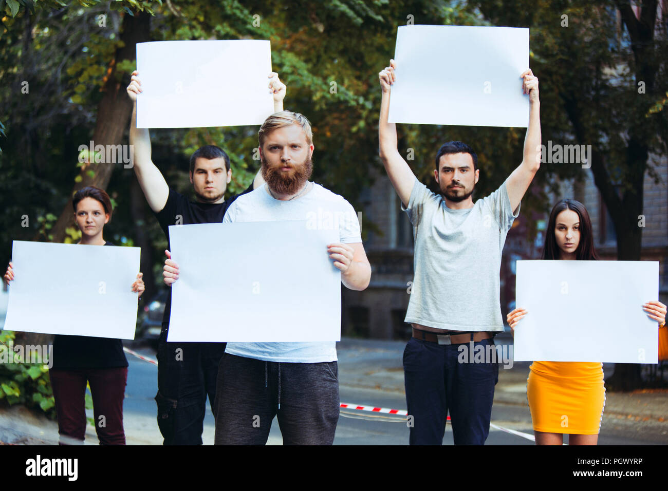 Group of protesting young people outdoors. The protest, people ...