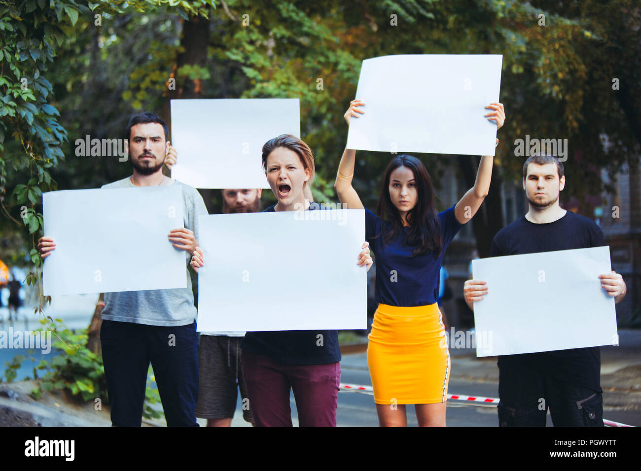 Group of protesting young people outdoors. The protest, people ...