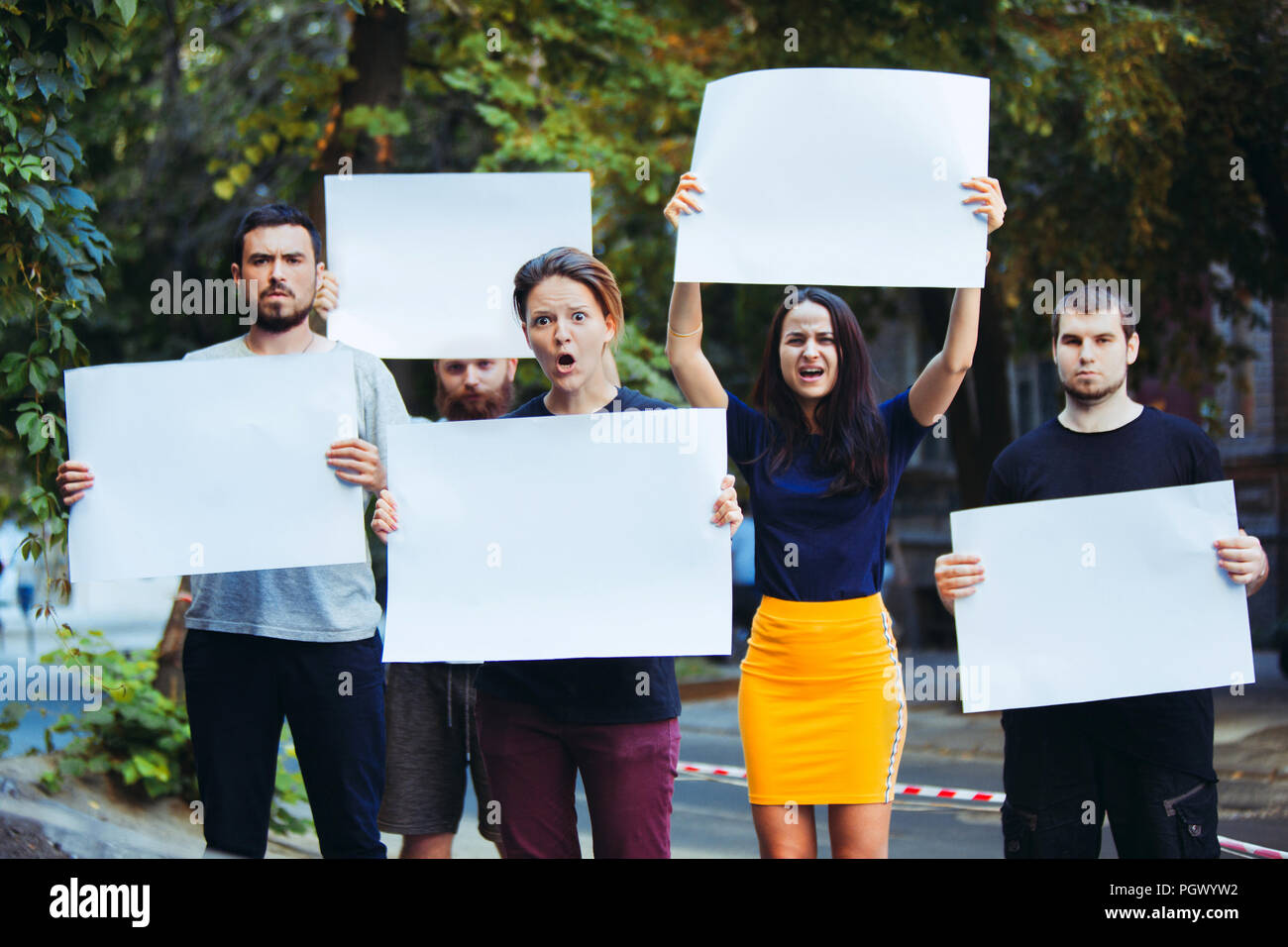 Group of protesting young people outdoors. The protest, people ...